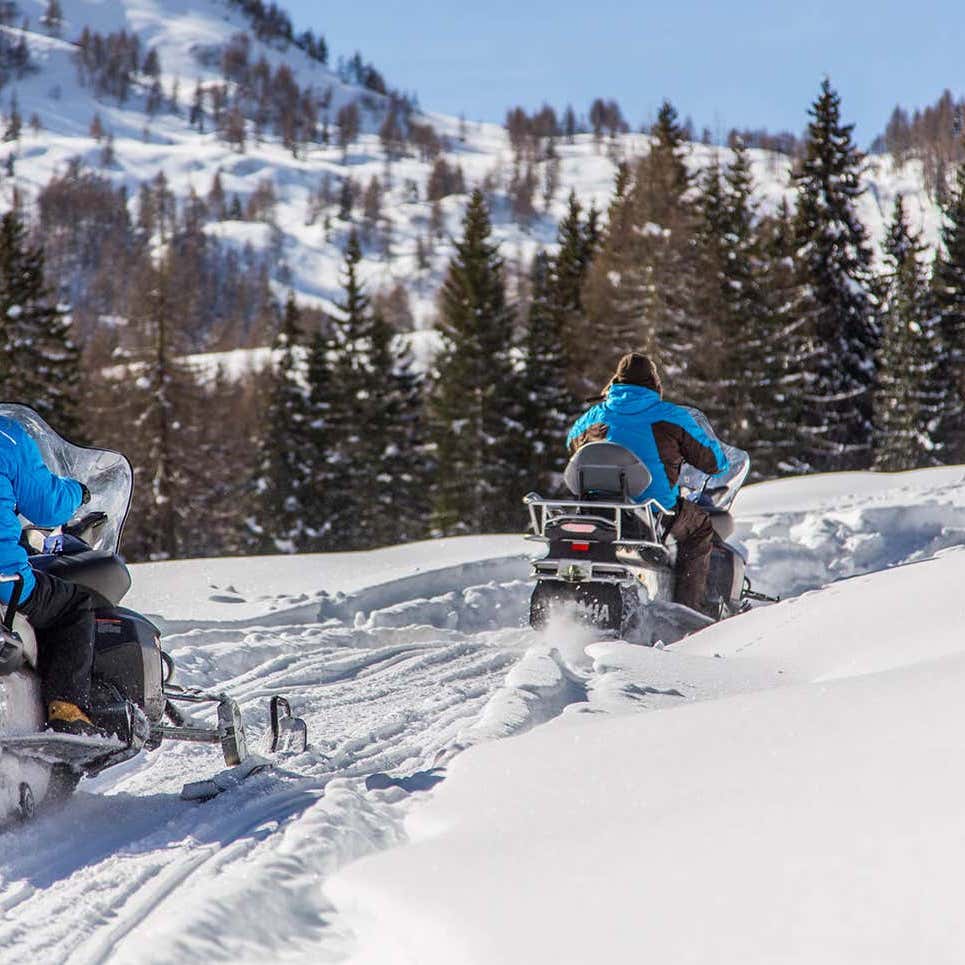 Tour in motoslitta sul Passo Digola con aperitivo al tramonto | Freedome