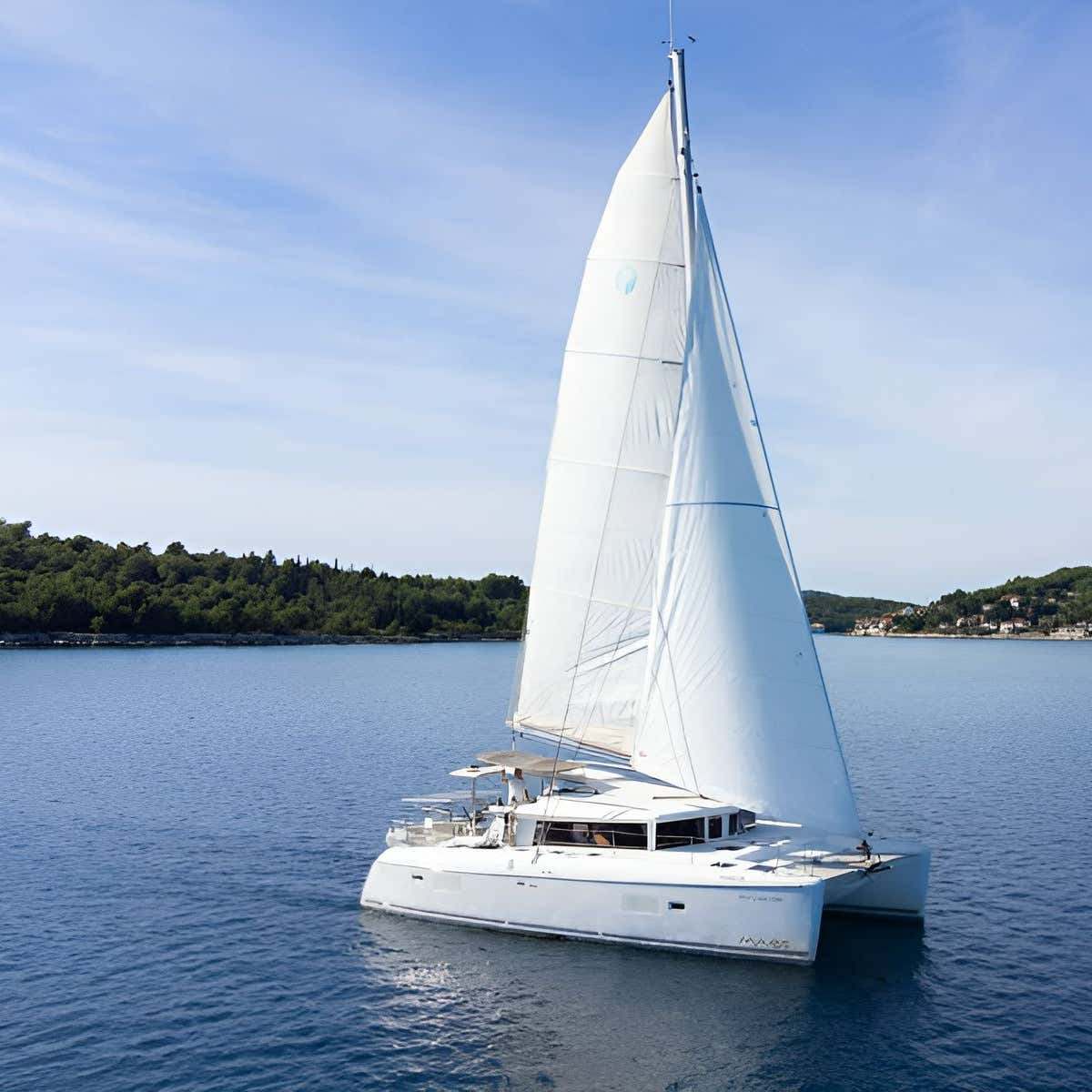 Escursione di un giorno in catamarano lungo la costa di Alghero | Freedome