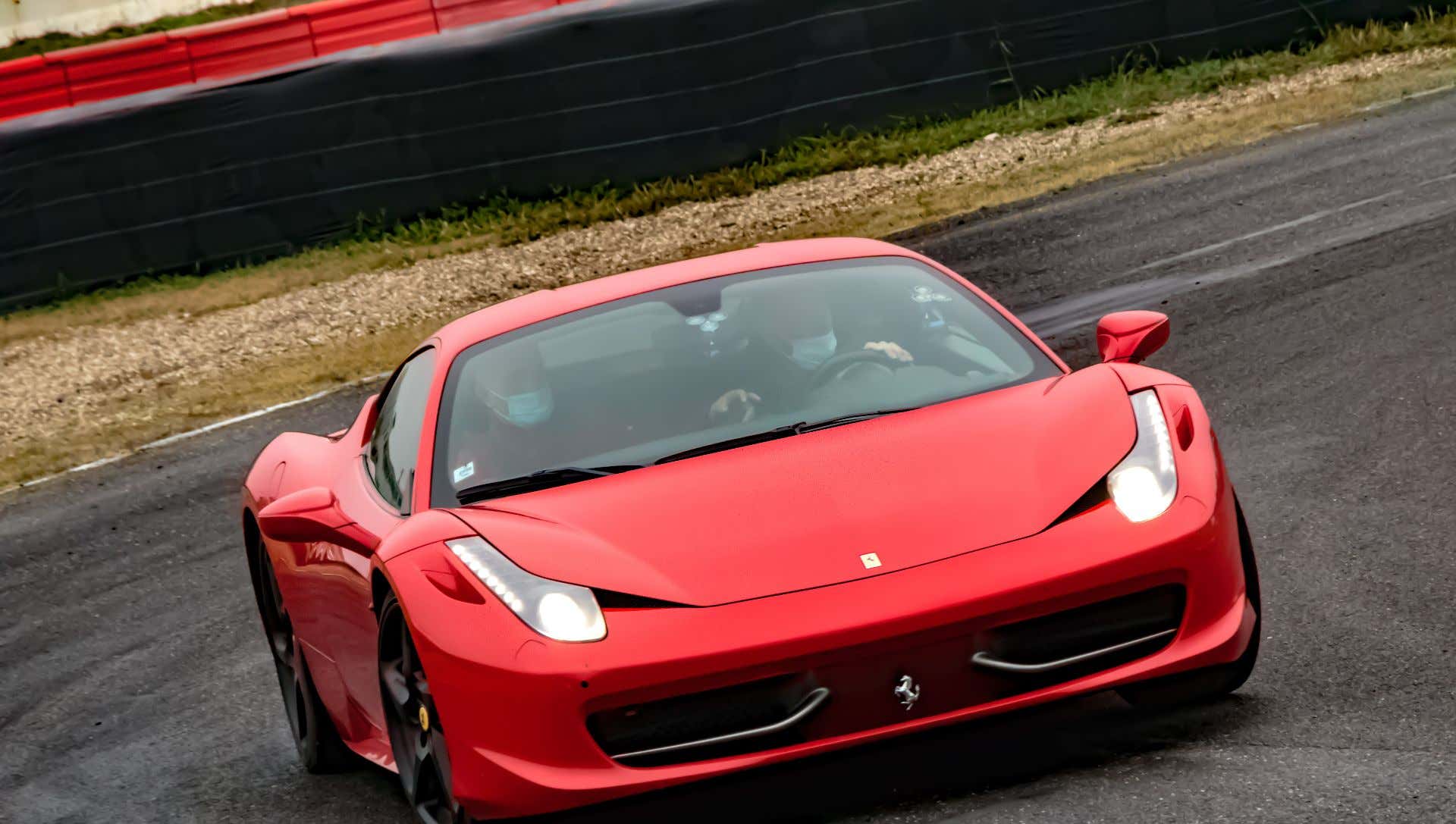 Track driving in 2 Ferrari F458 Italia at Castelletto Circuit (2+2 laps ...