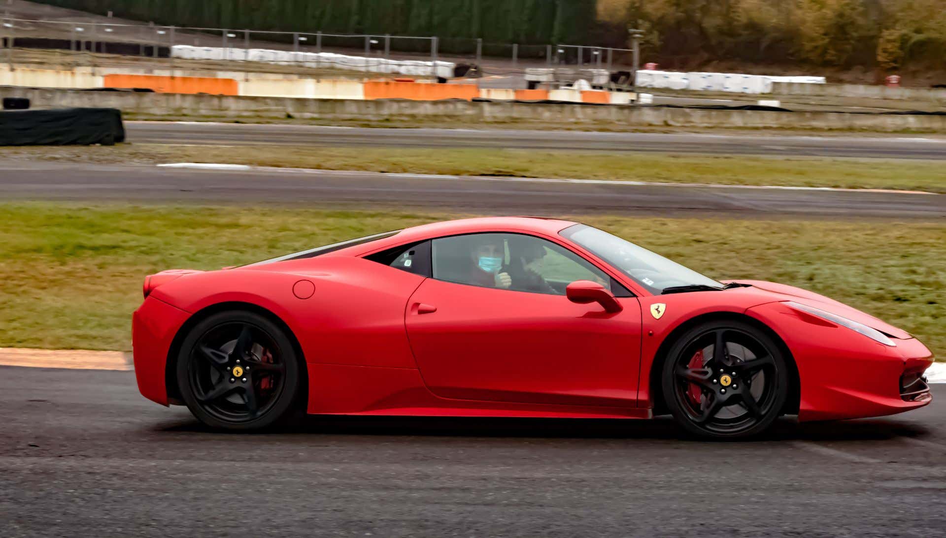 Track driving in 2 Ferrari F458 Italia at Castelletto Circuit (2+2 laps ...